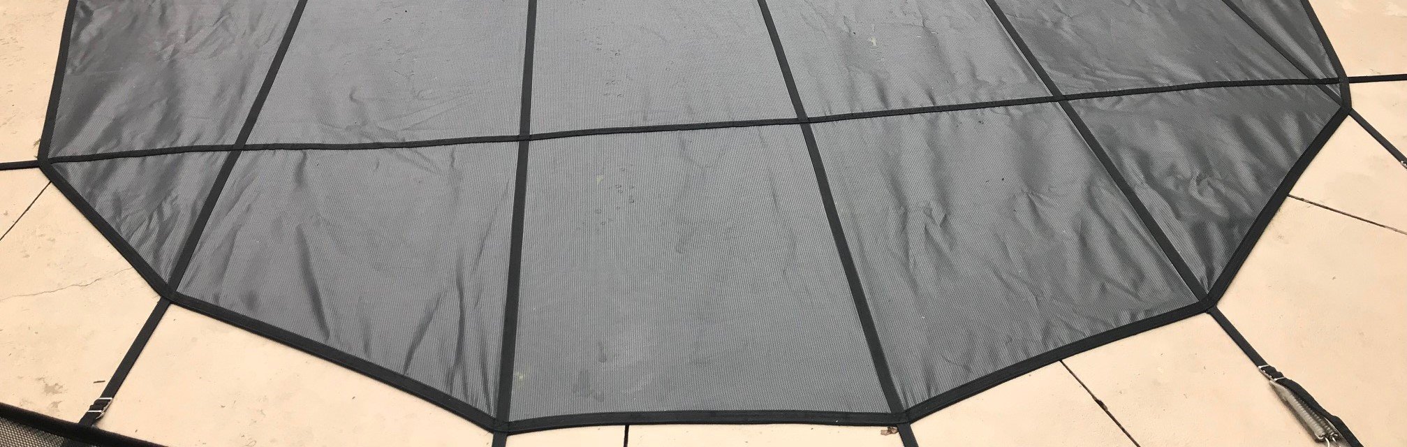 Mesh vs. Solid Safety Covers: Which Type Is Right for My Pool?